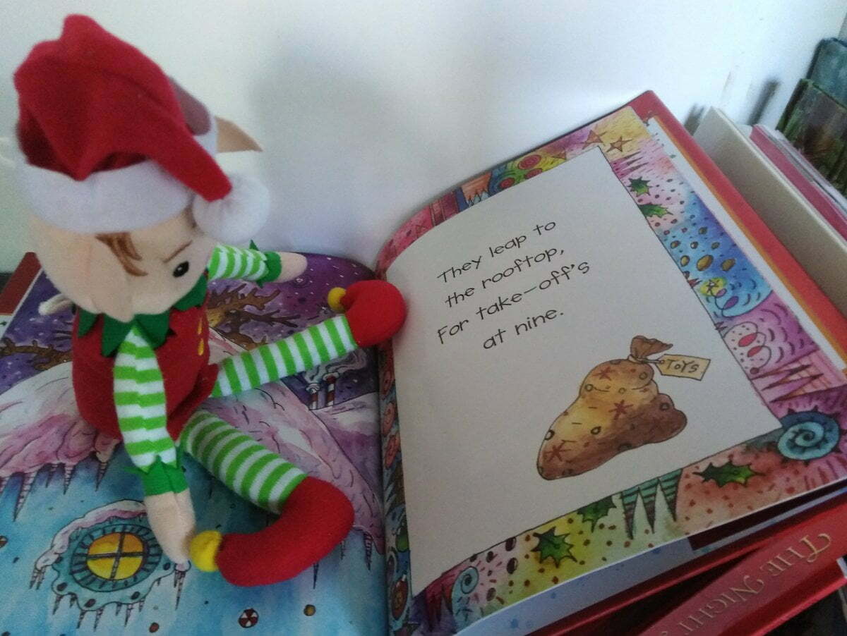 Tinkles the elf finds our Christmas books | Love Santa